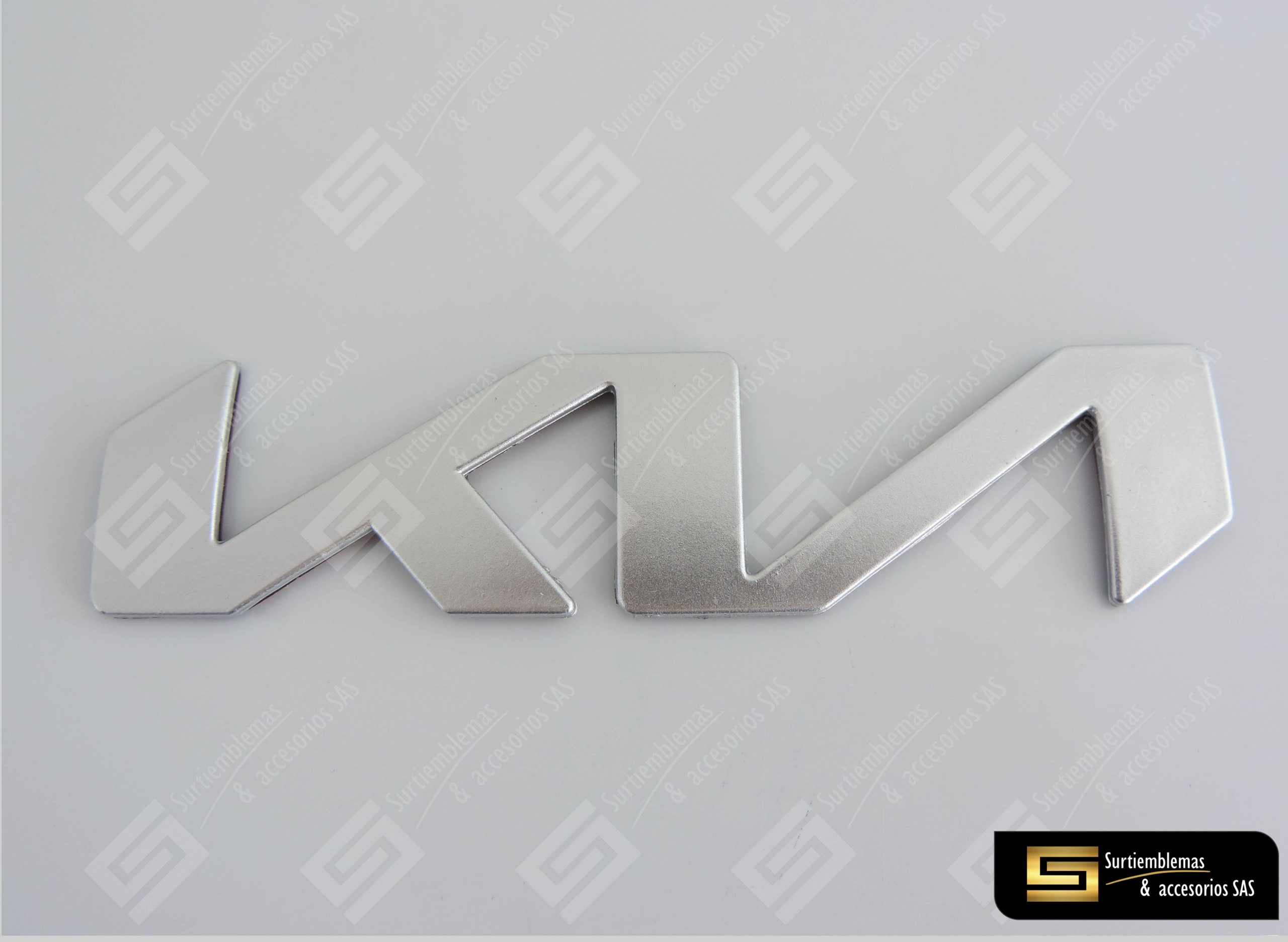 K55 – Surtiemblemas